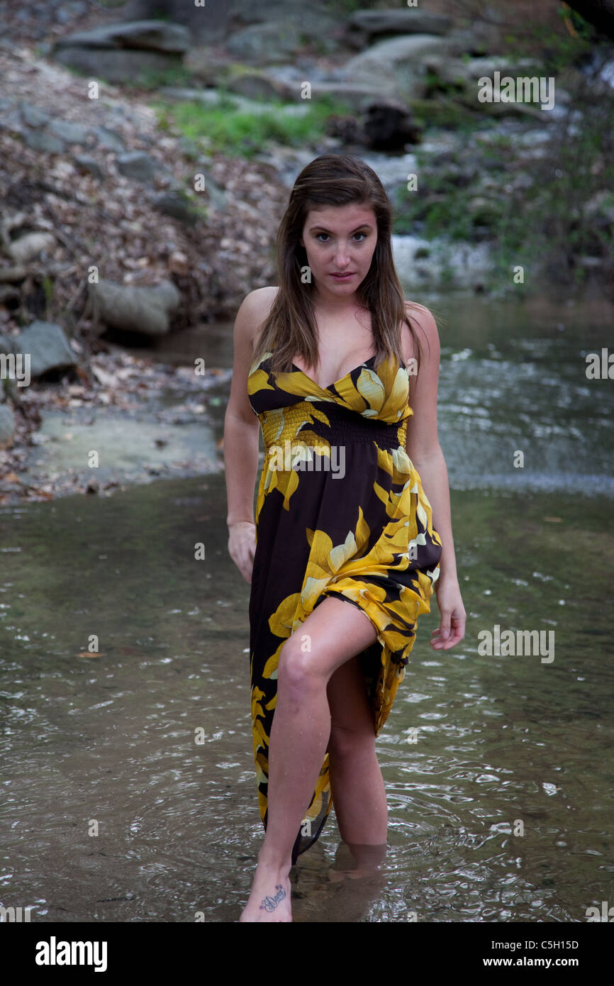 Woman wearing dress in water hi-res stock photography and images - Alamy