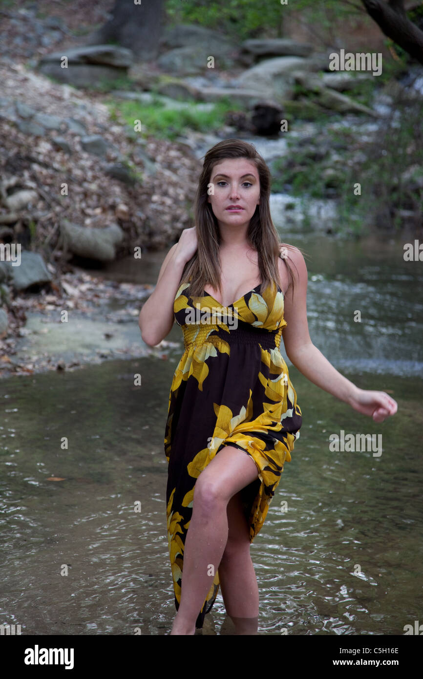 Woman wearing dress in water hi-res stock photography and images - Alamy