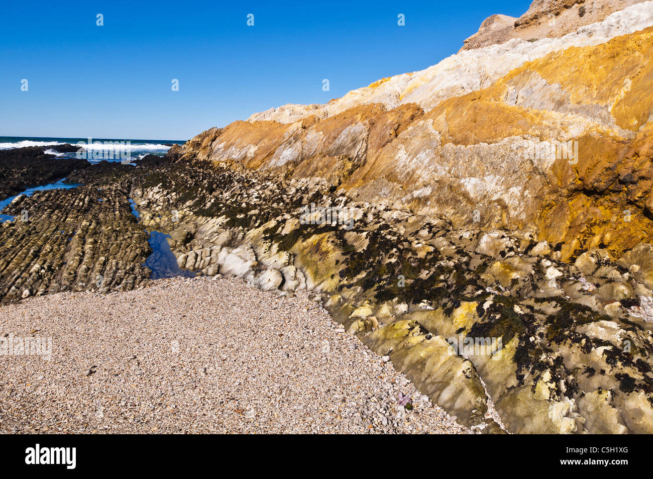 Colorful sedimentary rock and tidepools, Montana de Oro State Park ...