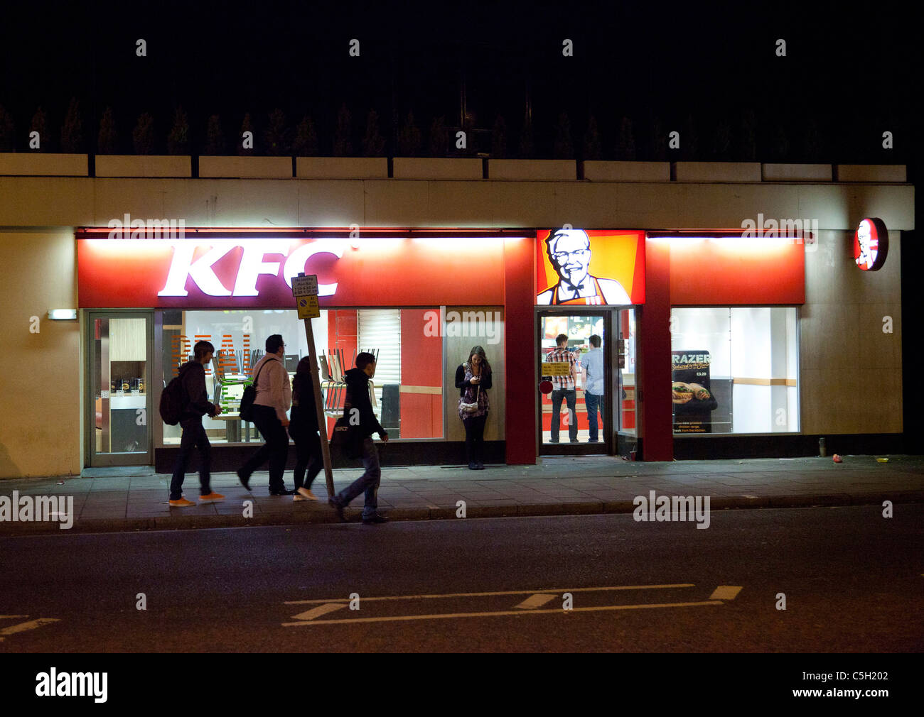 KFC restaurant at night in UK Stock Photo - Alamy