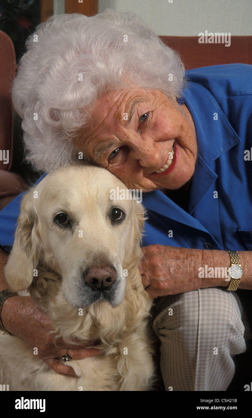 portrait of elderly lady and golden retriever Stock Photo - Alamy