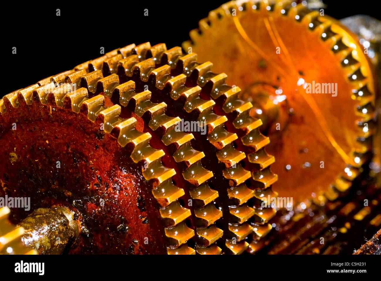 A set of gears covered with hot, melted glue works interactively in a ...