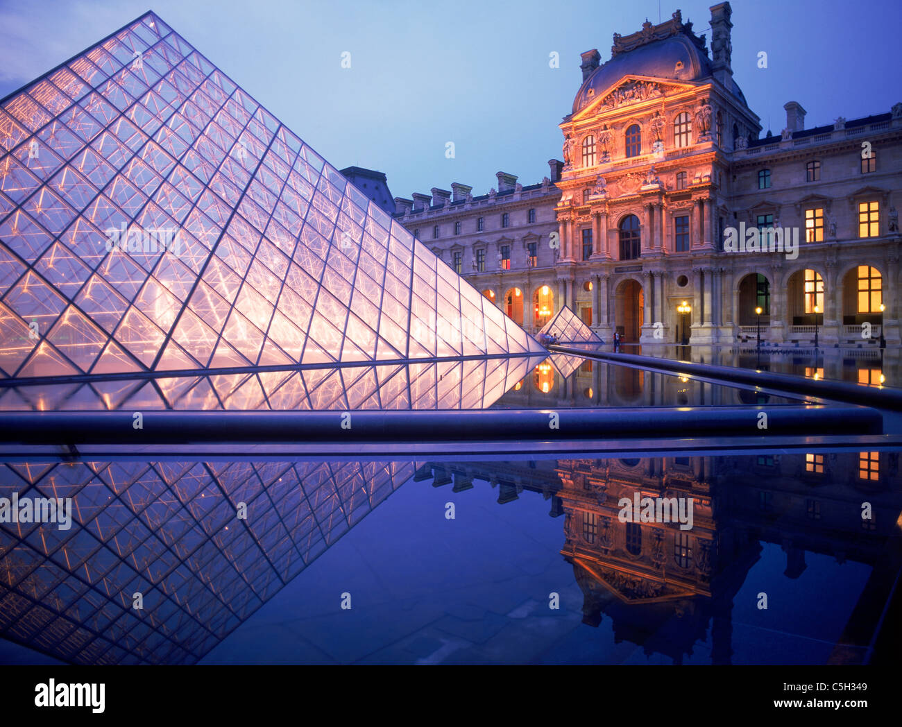 Louvre Museum and Pyramide at night in Paris France Stock Photo - Alamy