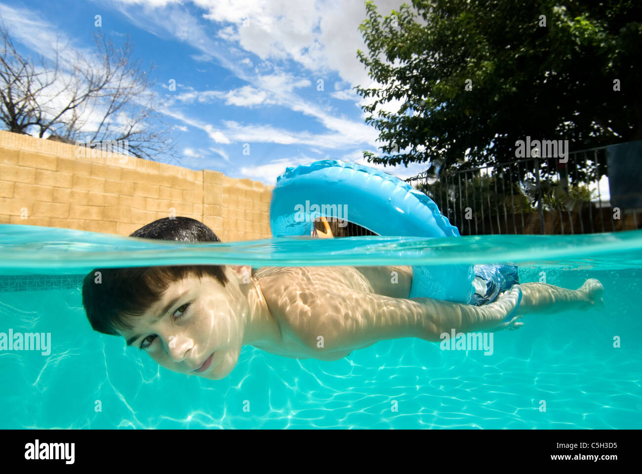 Boy floats hi-res stock photography and images - Alamy