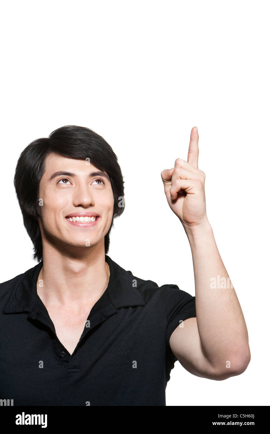 Young Man Pointing Up Stock Photo - Alamy