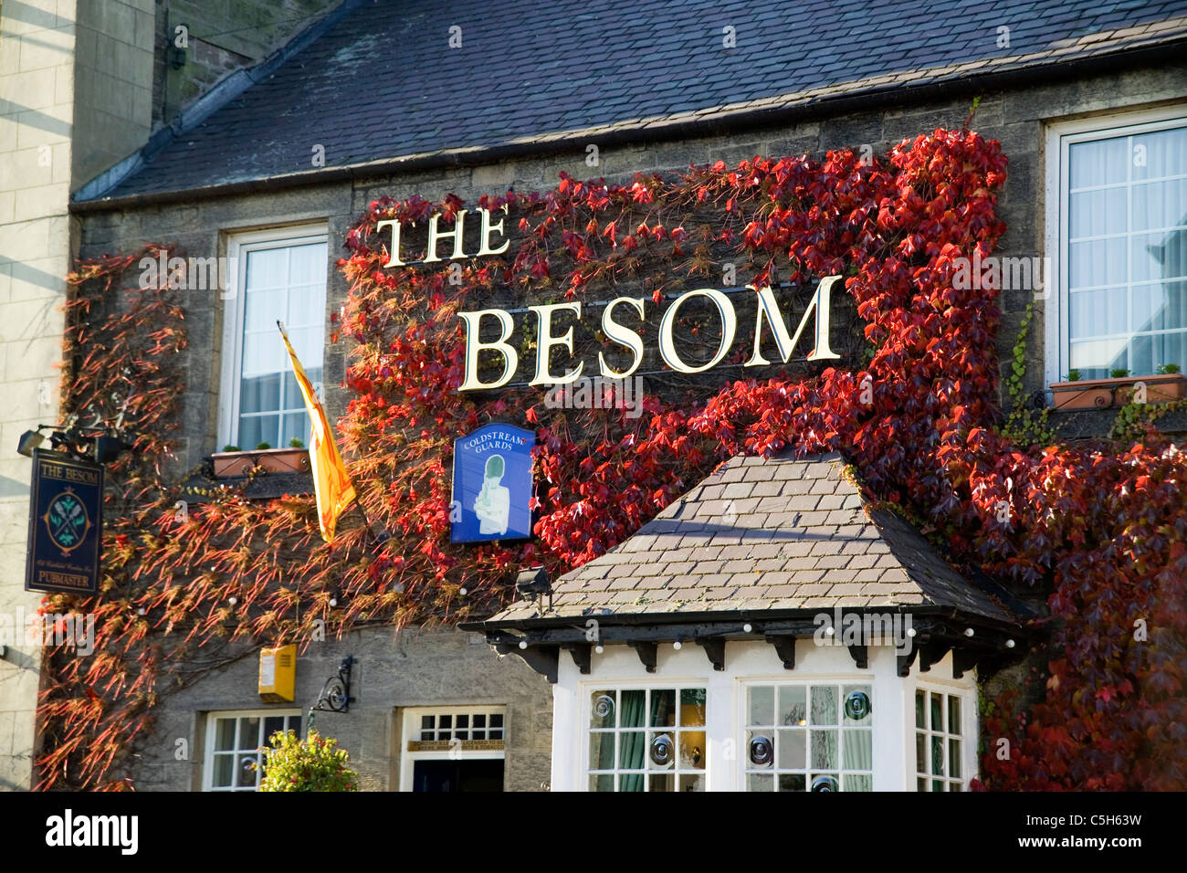 The Besom Inn Hotel and pub with virginia creeper - Coldstream Stock ...