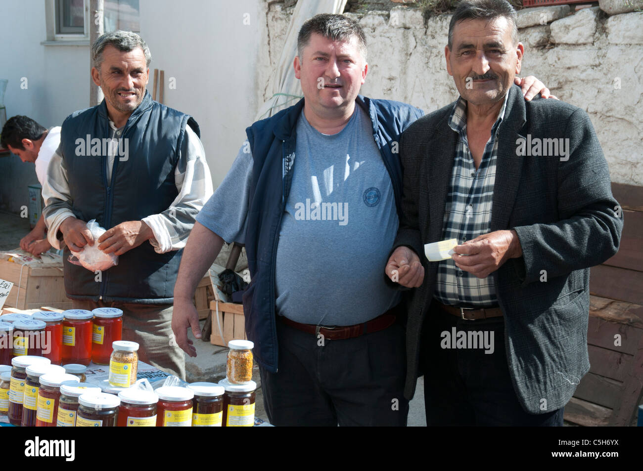 Stallholders at the weekly produce market in this provincial town in ...