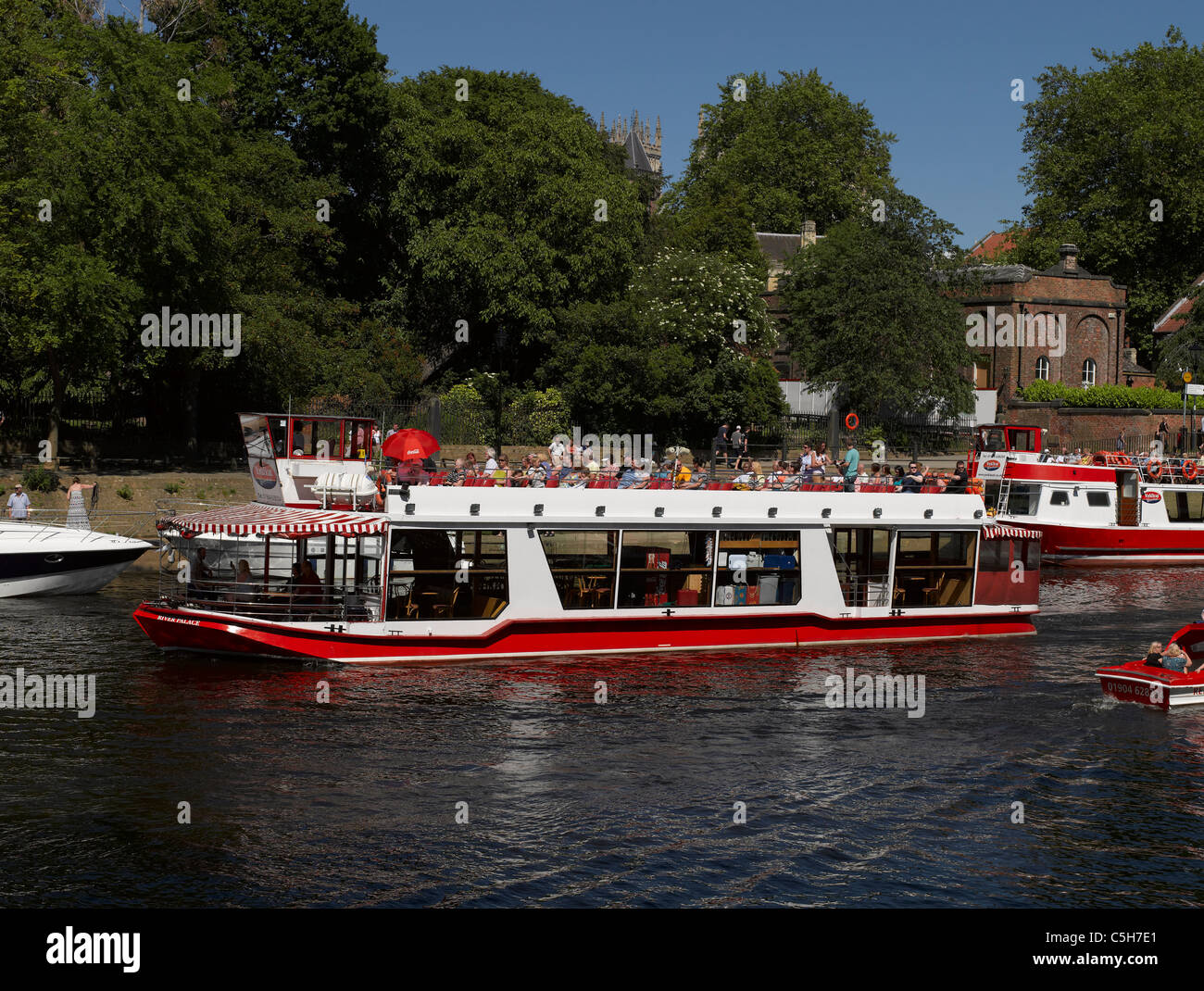 People tourists visitors on board a pleasure boat boats on River Ouse ...