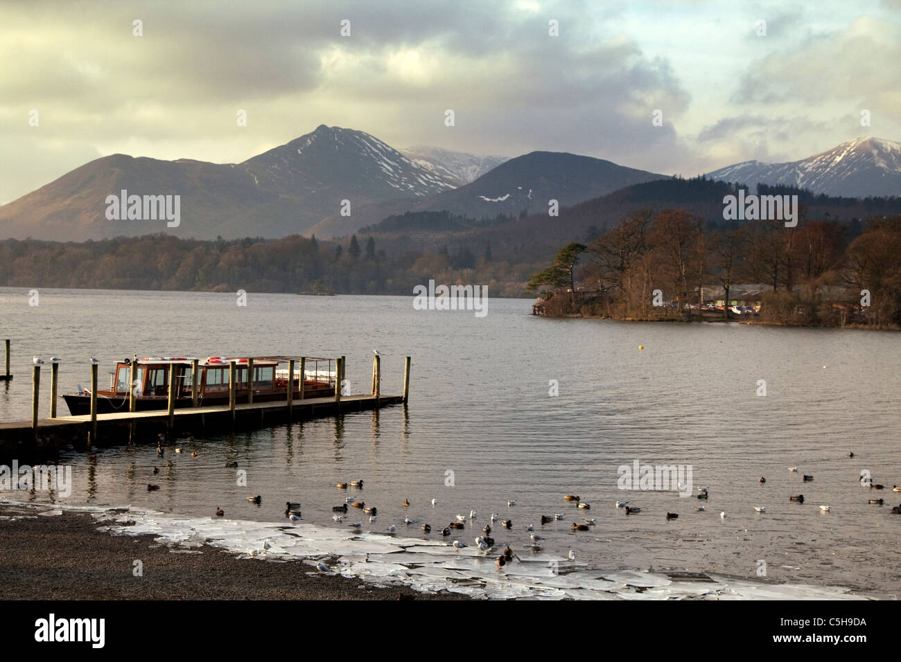 Keswick landing stage and passenger launch on Derwent Water with ice on ...