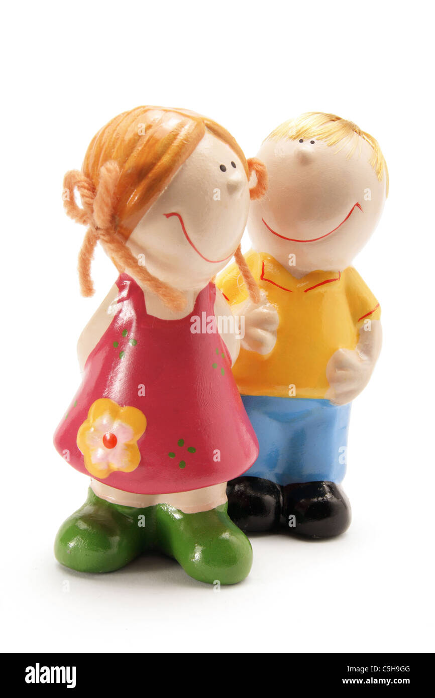 Boy and Girl Figurines Stock Photo - Alamy