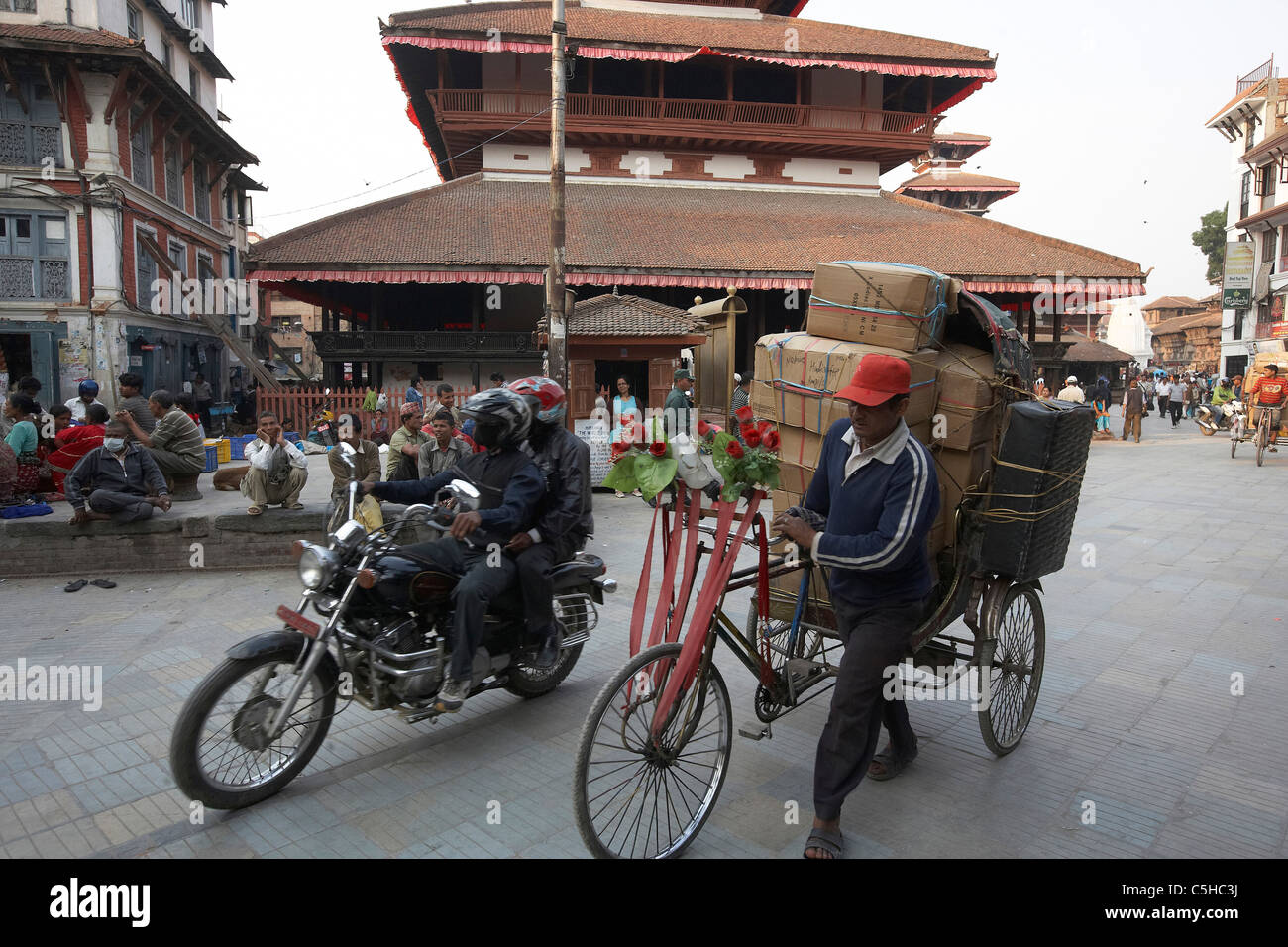 Street scene, man with large load on his rickshaw, Durbar Square ...