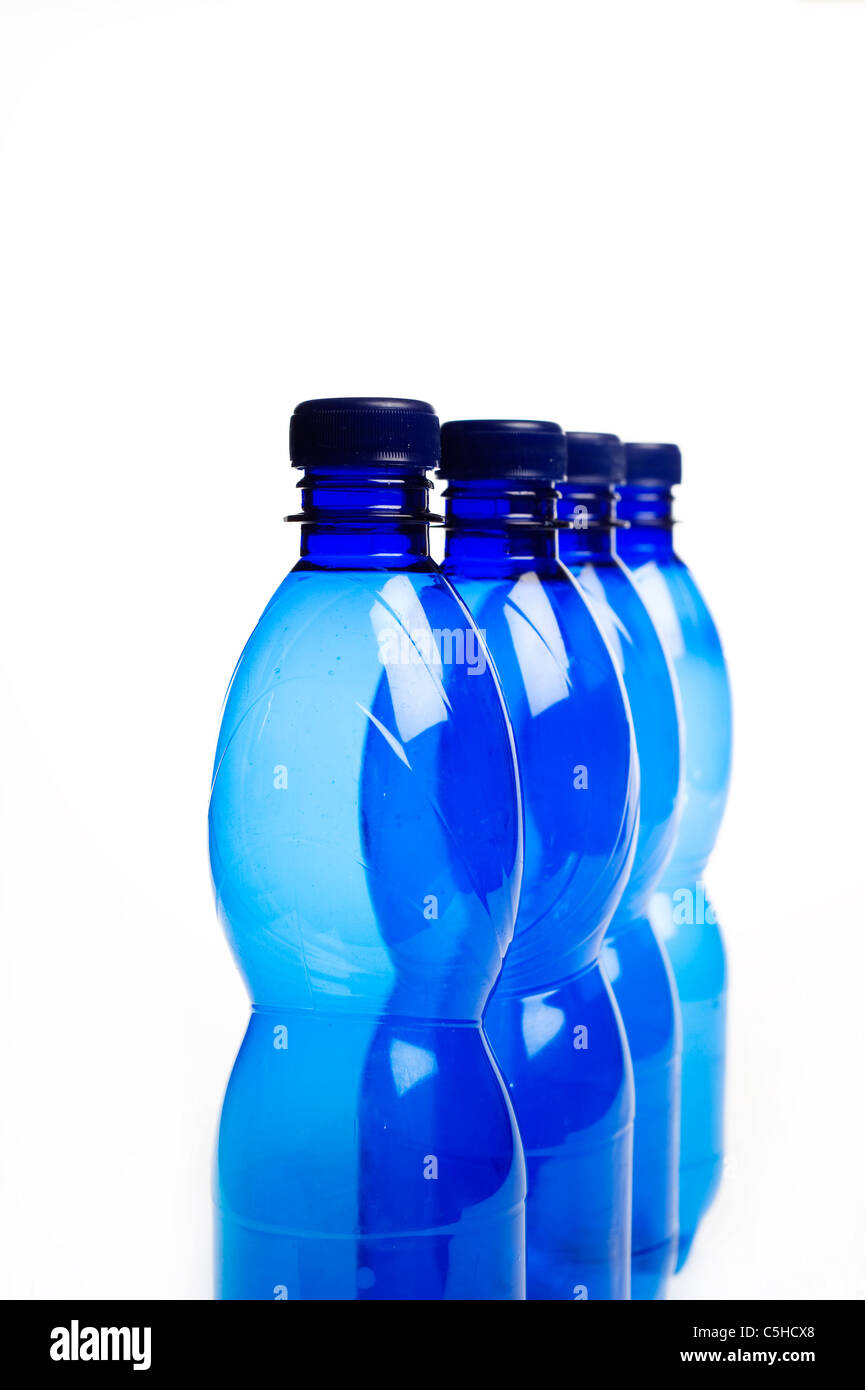 blue plastic bottle in a row Stock Photo - Alamy