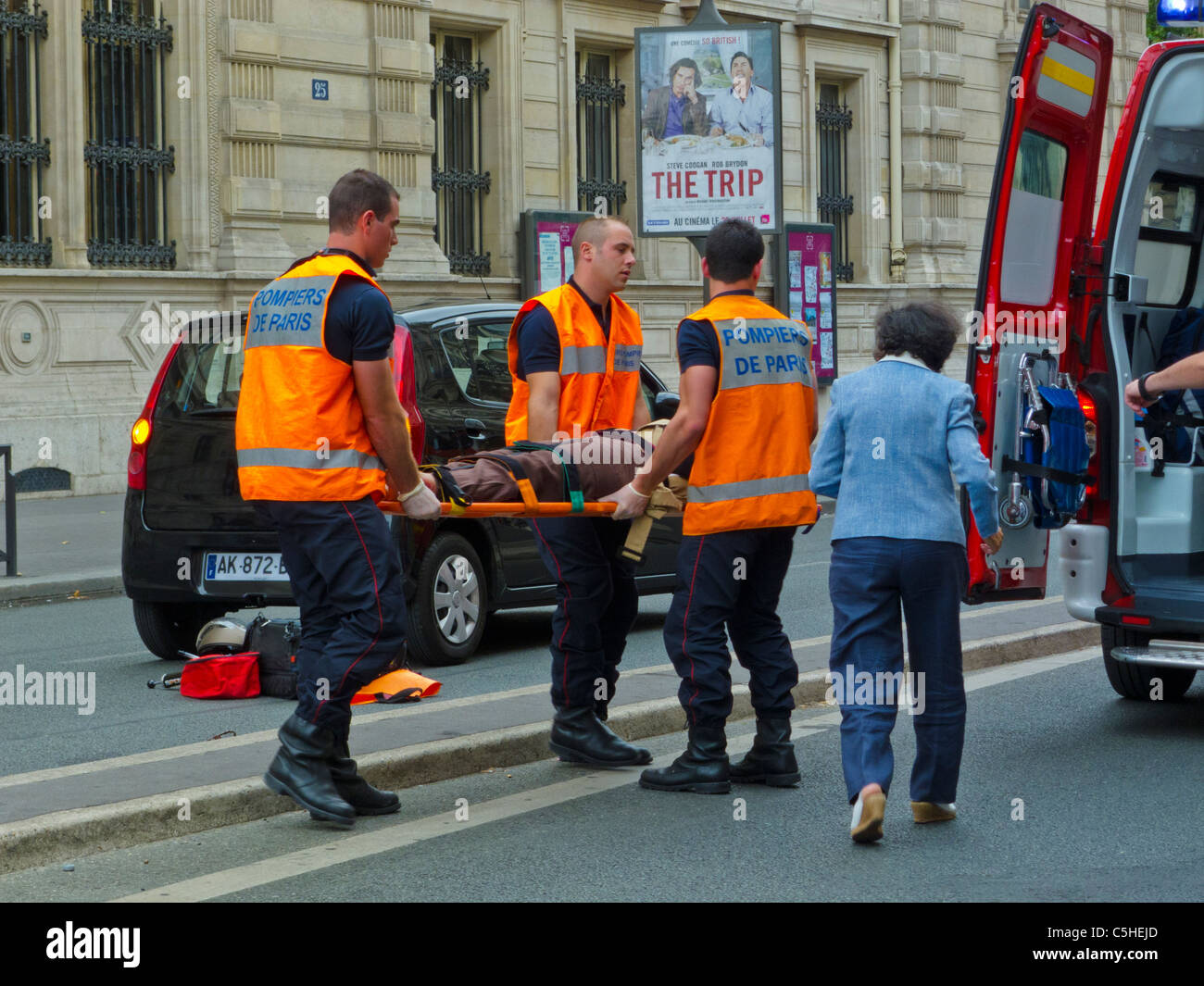 Paris, France, French Firemen Carrying Stretcher to Ambulance at ...