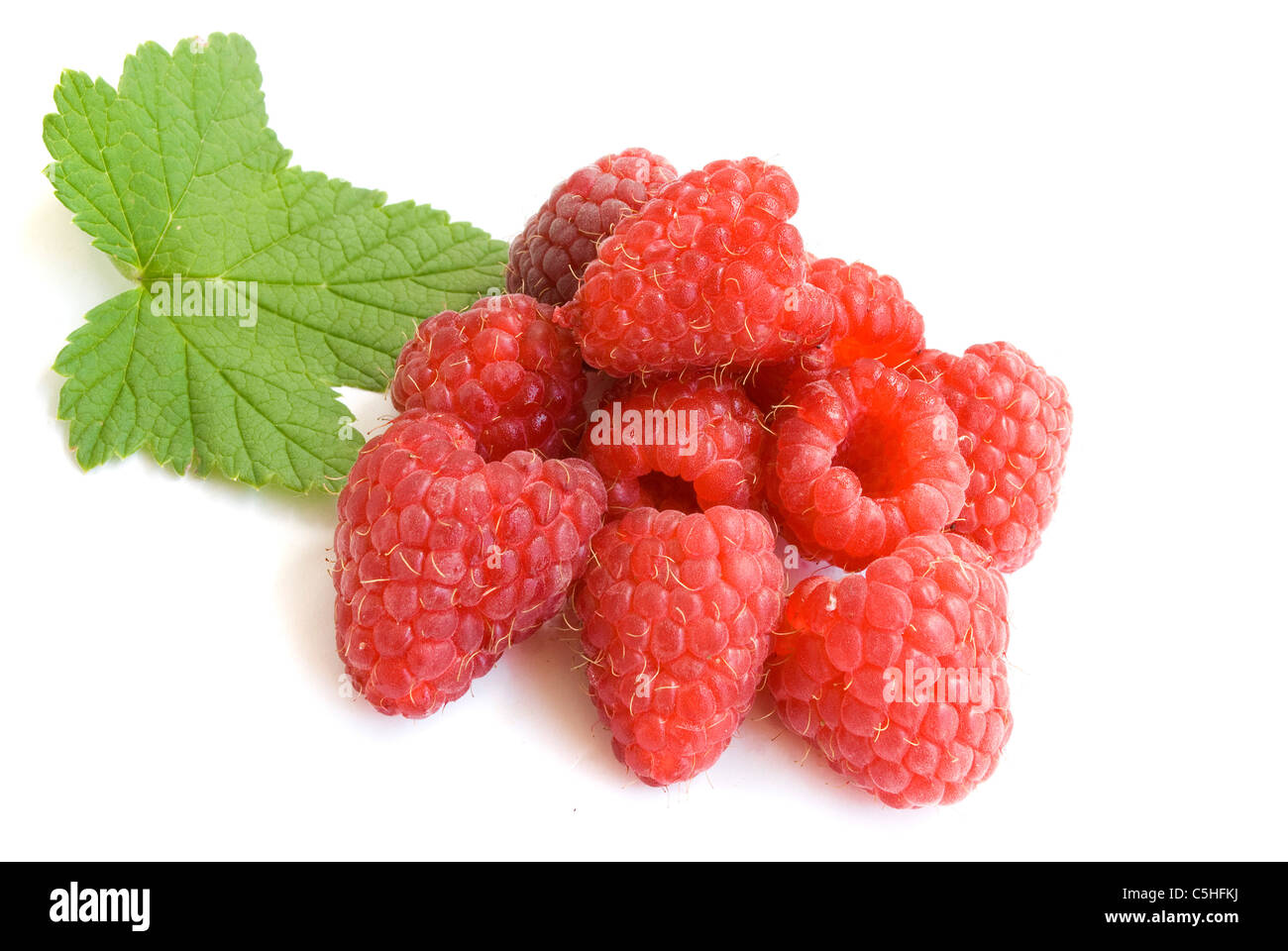 ripe red raspberries isolated on white background Stock Photo - Alamy