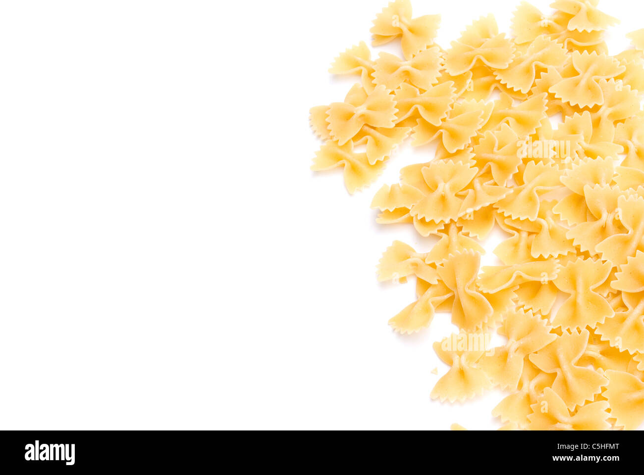 ribbon shaped pasta isolated on white background Stock Photo - Alamy