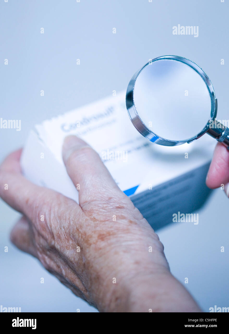 Woman checking care label hi-res stock photography and images - Alamy