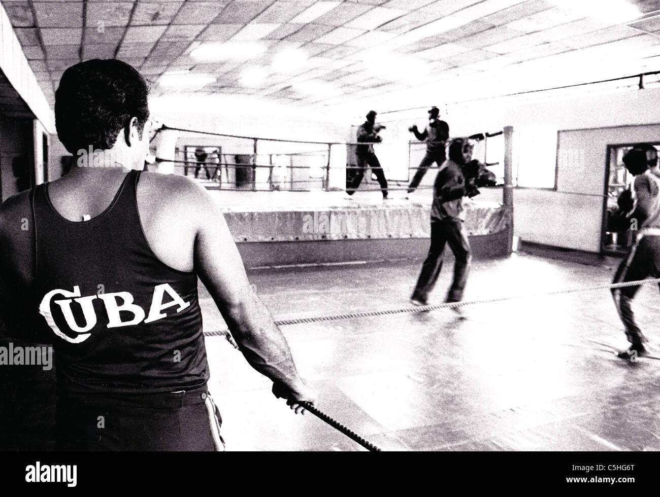 Cuba. Boxers and coach at an Olympic boxing training gym in Havana ...
