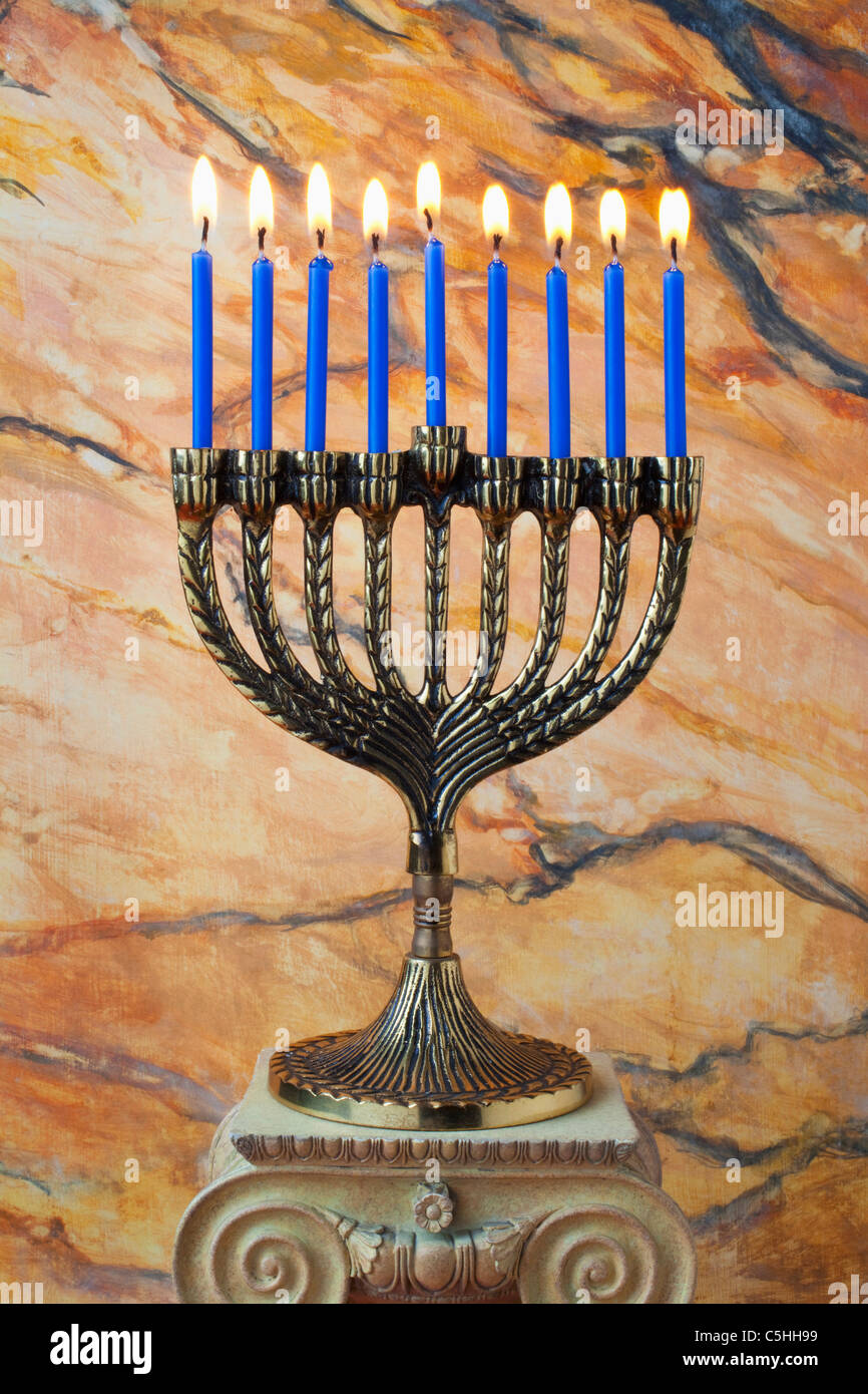 Menorah with blue candles Stock Photo - Alamy