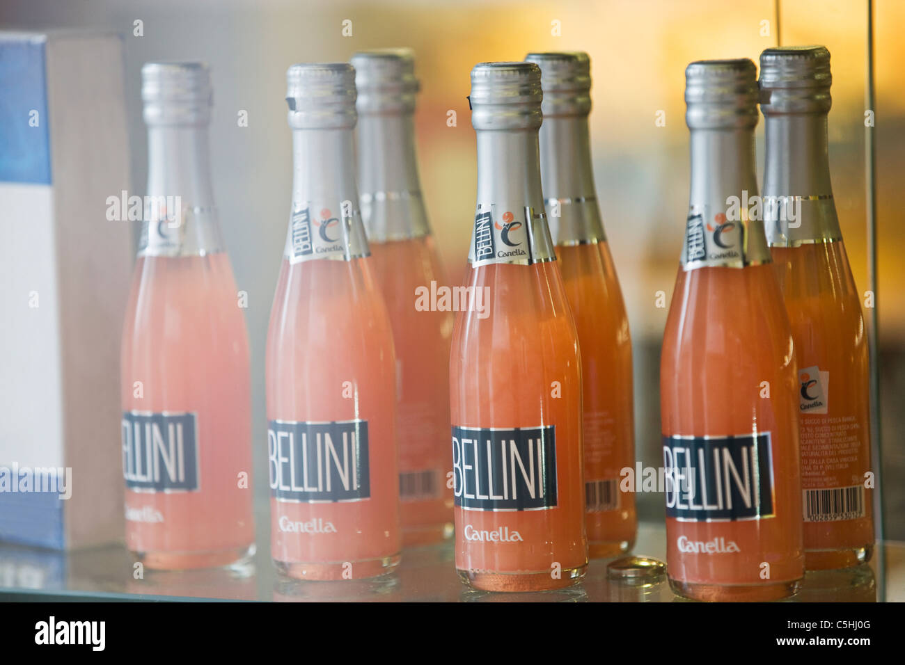 Bottles of Bellini in a shop window, Venice, Italy Stock Photo - Alamy