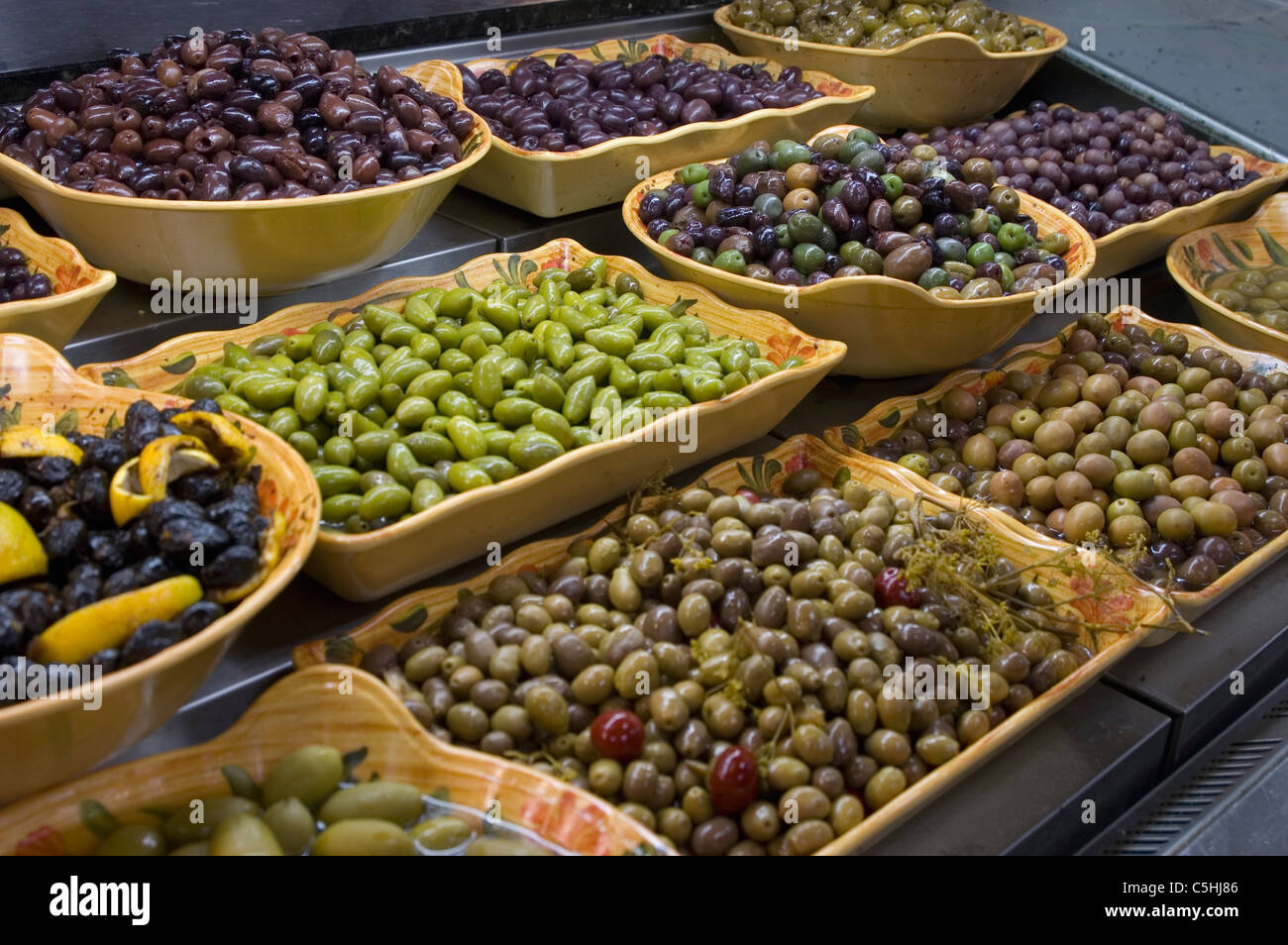 Green olives in marinade hi-res stock photography and images - Alamy