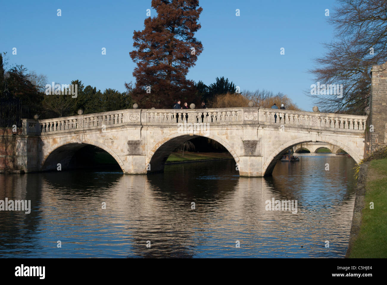 Bridge reflected in river Cam Cambridge near Kings College and Clare ...