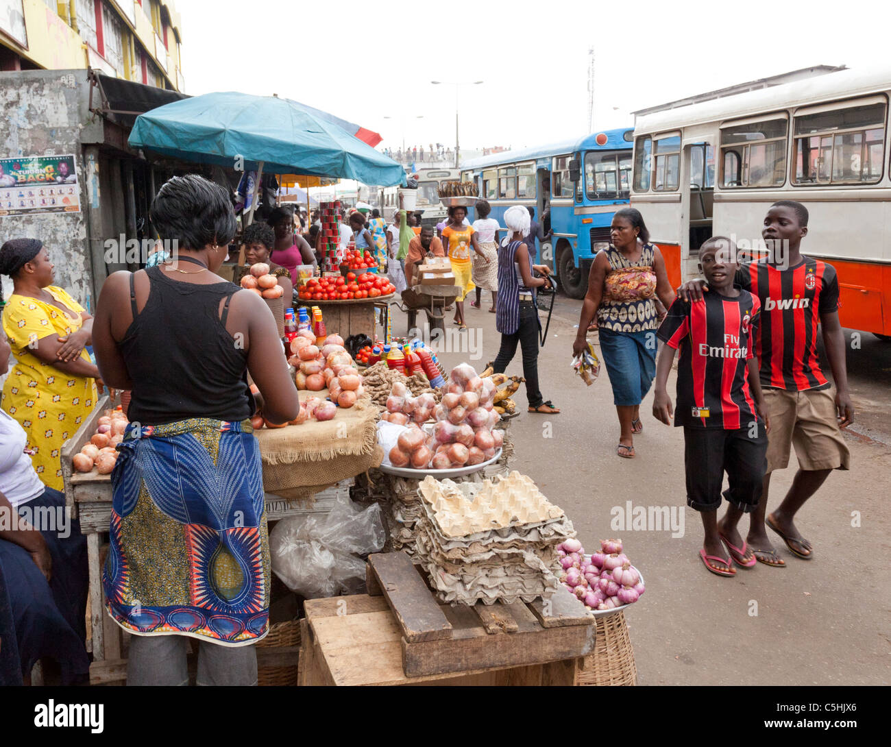 Market Street Scene with market traders selling a range of fresh food ...
