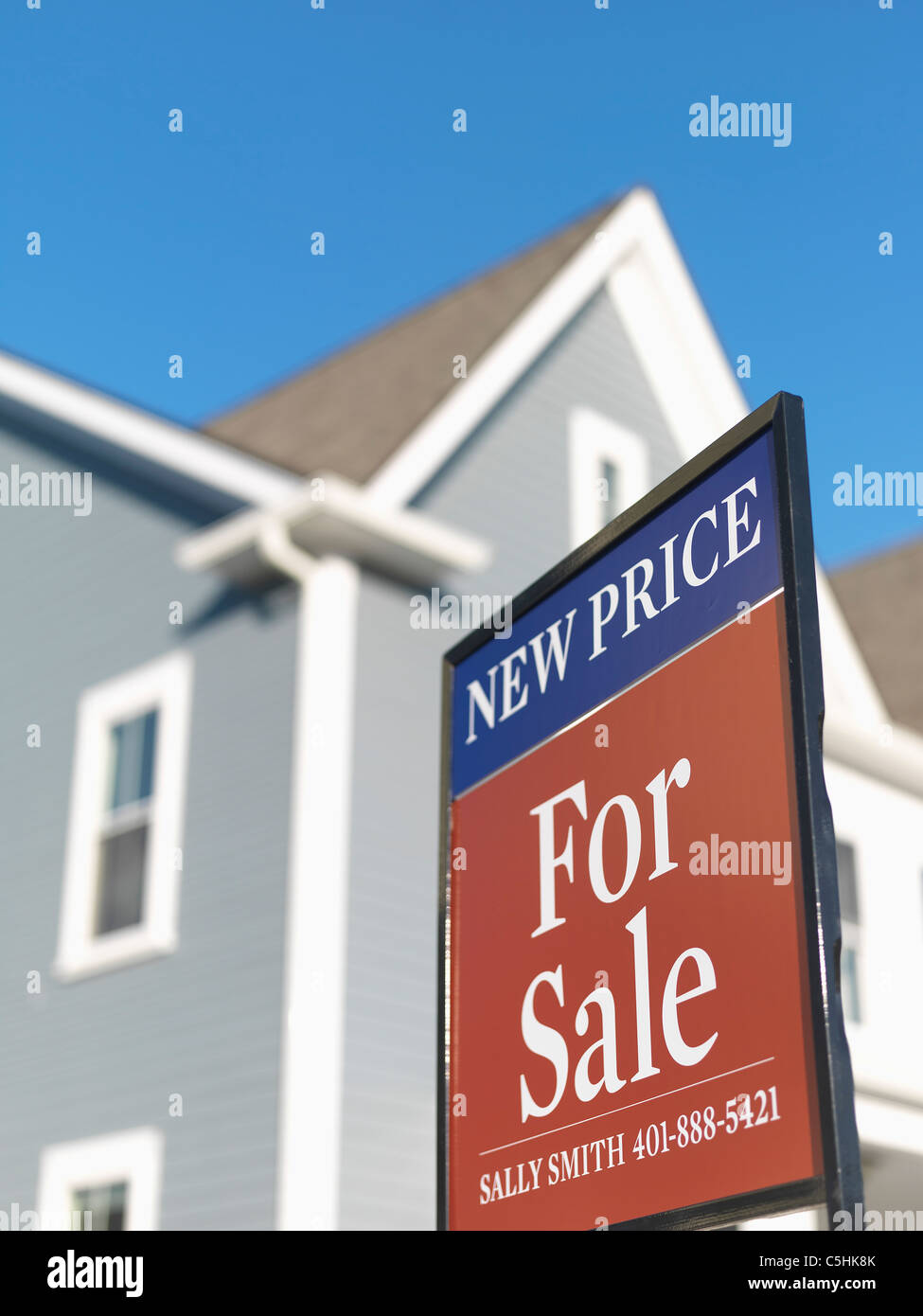 realtors sign with house in backround Stock Photo - Alamy