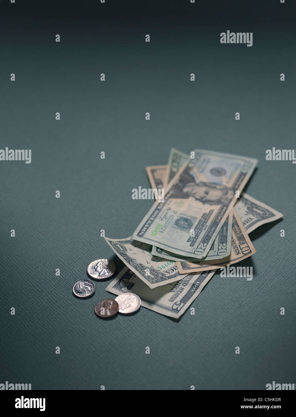 pile of cash - notes and coins Stock Photo - Alamy