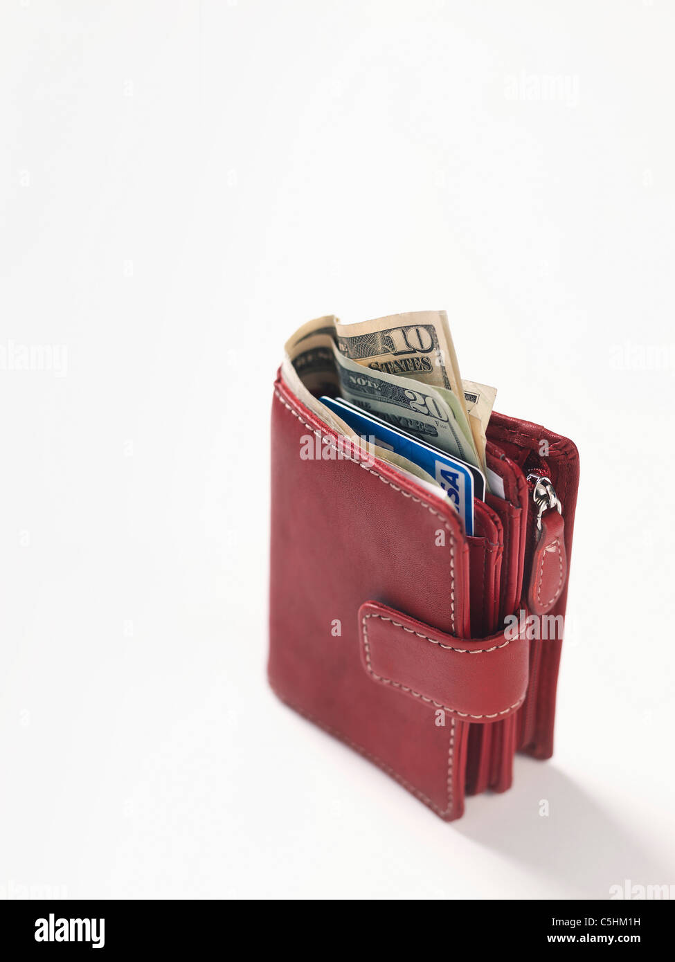 Money stuffed wallet hi-res stock photography and images - Alamy