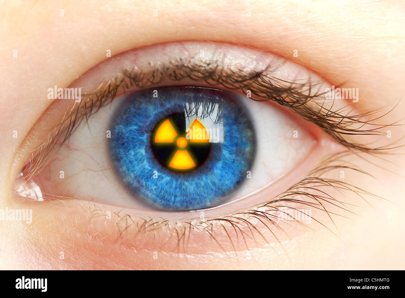 Eye with radiation warning sign Stock Photo - Alamy