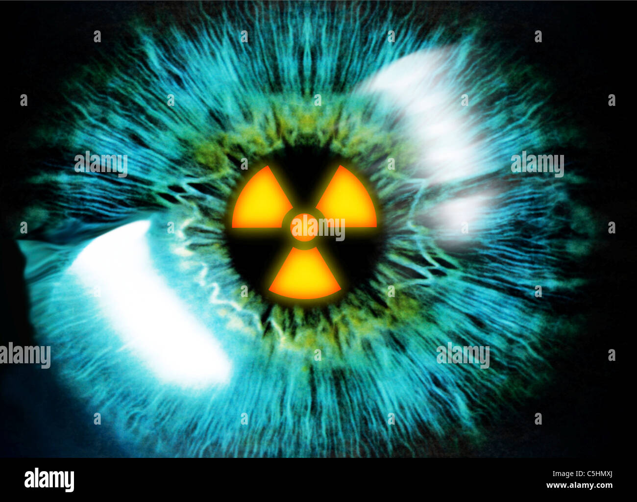 Iris with radiation warning sign Stock Photo - Alamy