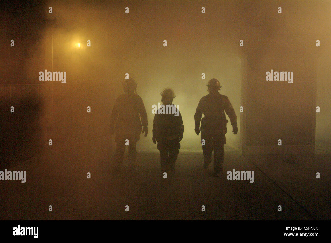 Firefighters inside building hi-res stock photography and images - Alamy