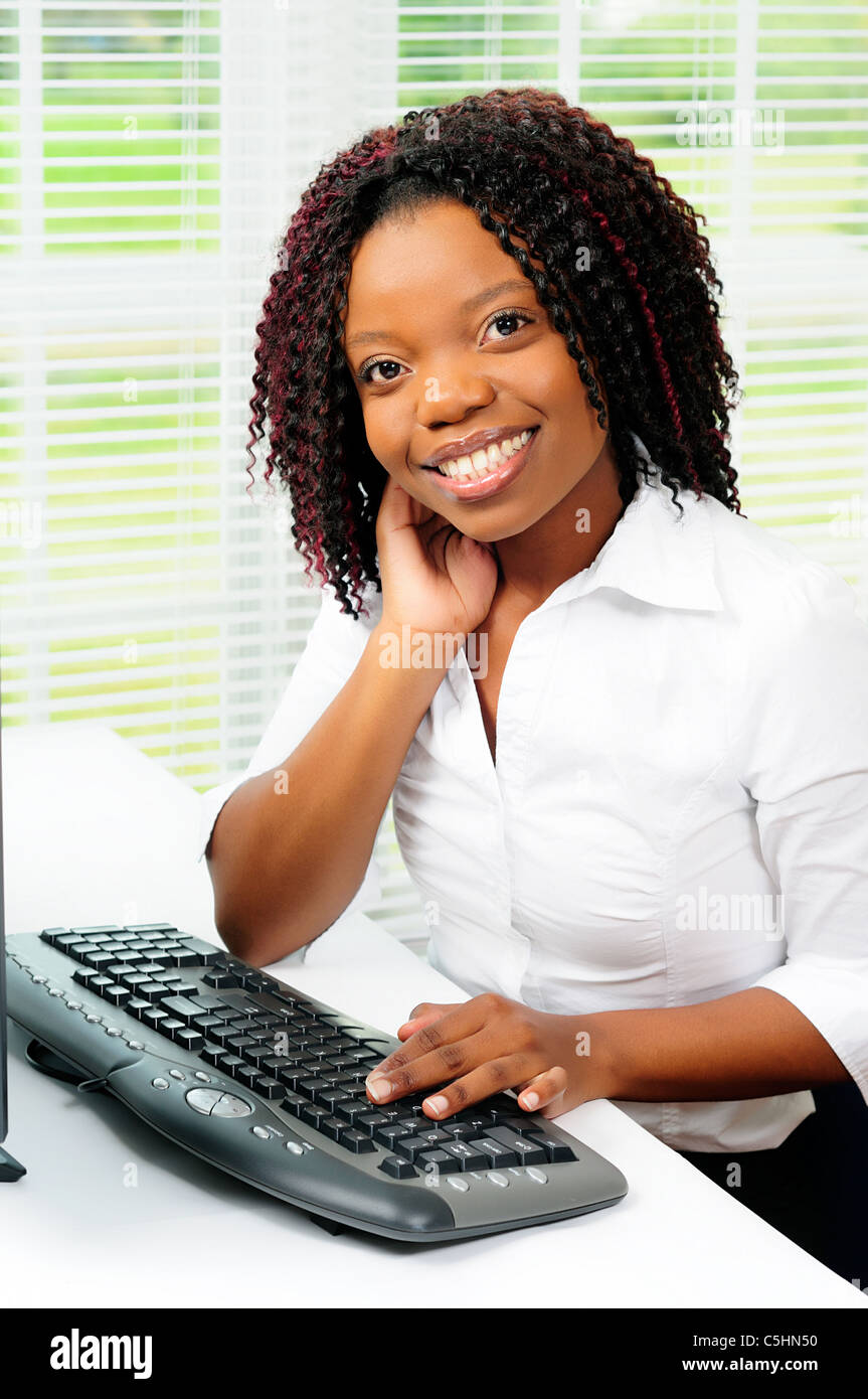 Beautiful Female African American Office Worker Sat At Her Computer ...
