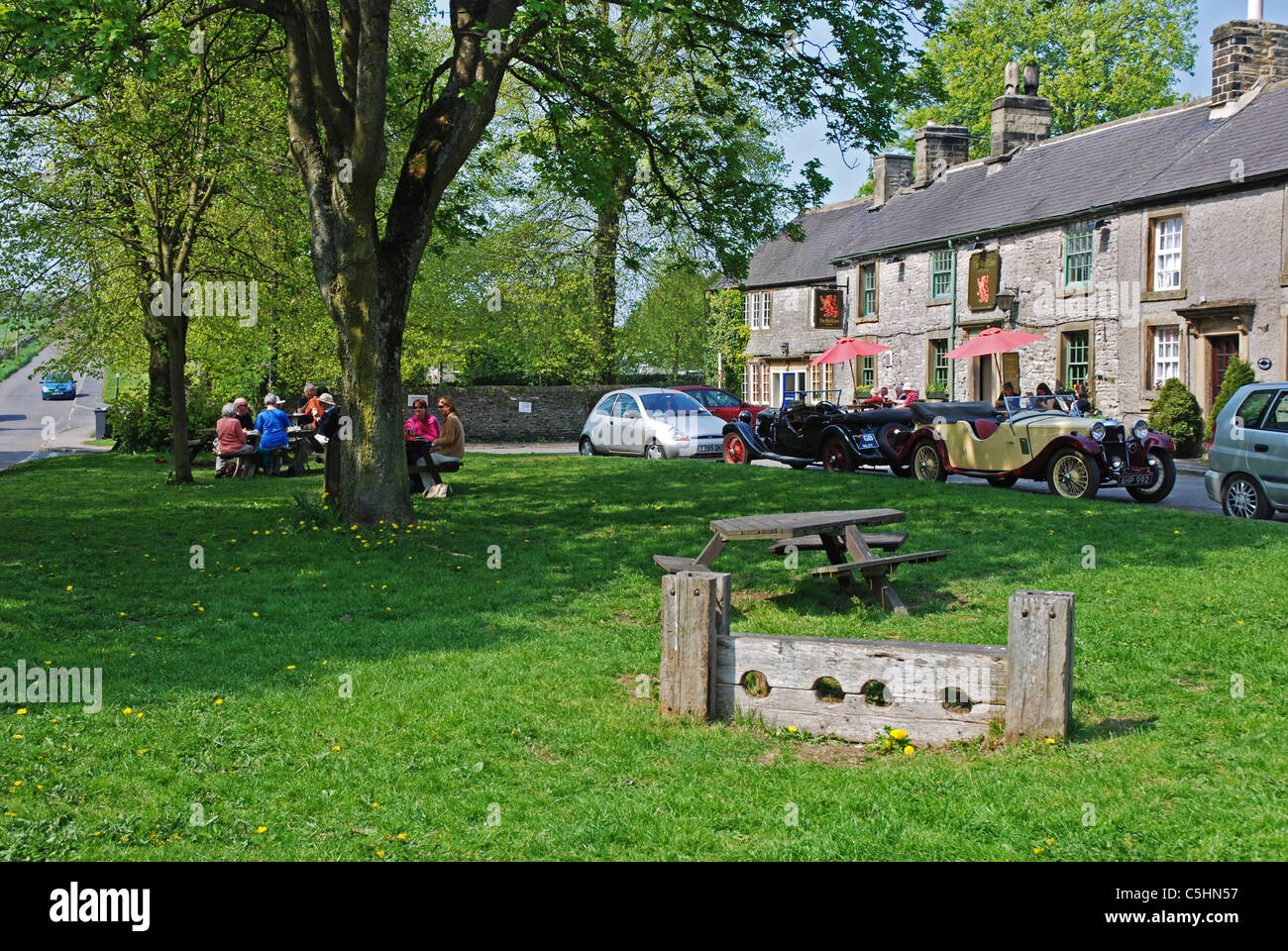 Village green at Litton in Derbyshire England with old stocks and ...