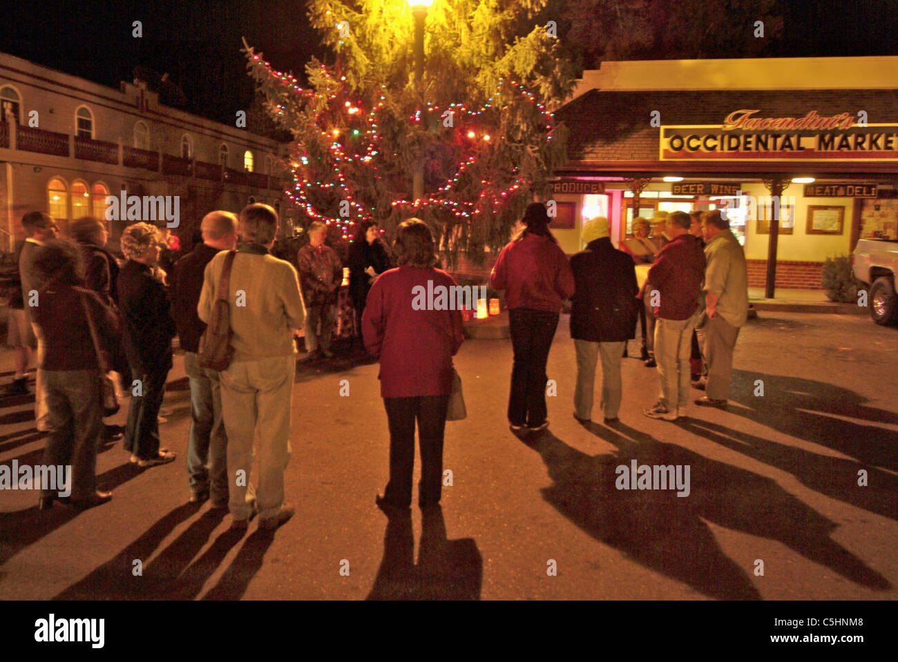 Choir singing carols christmas tree hi-res stock photography and images ...