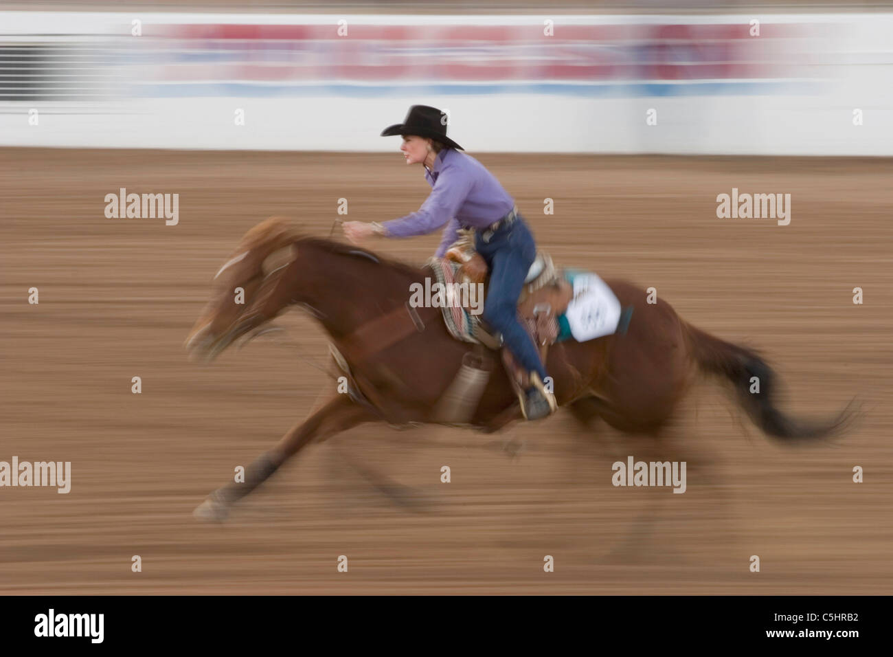 At the Tucson Rodeo riders in the women's barrel racing competition in ...