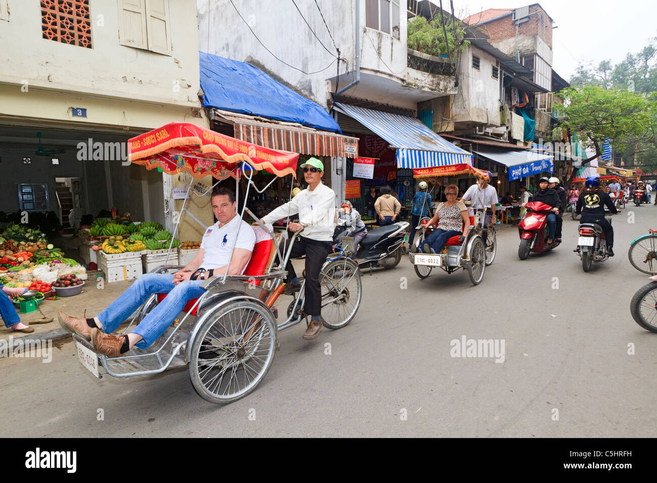 Hanoi tourists in bicycle rickshaws hi-res stock photography and images ...