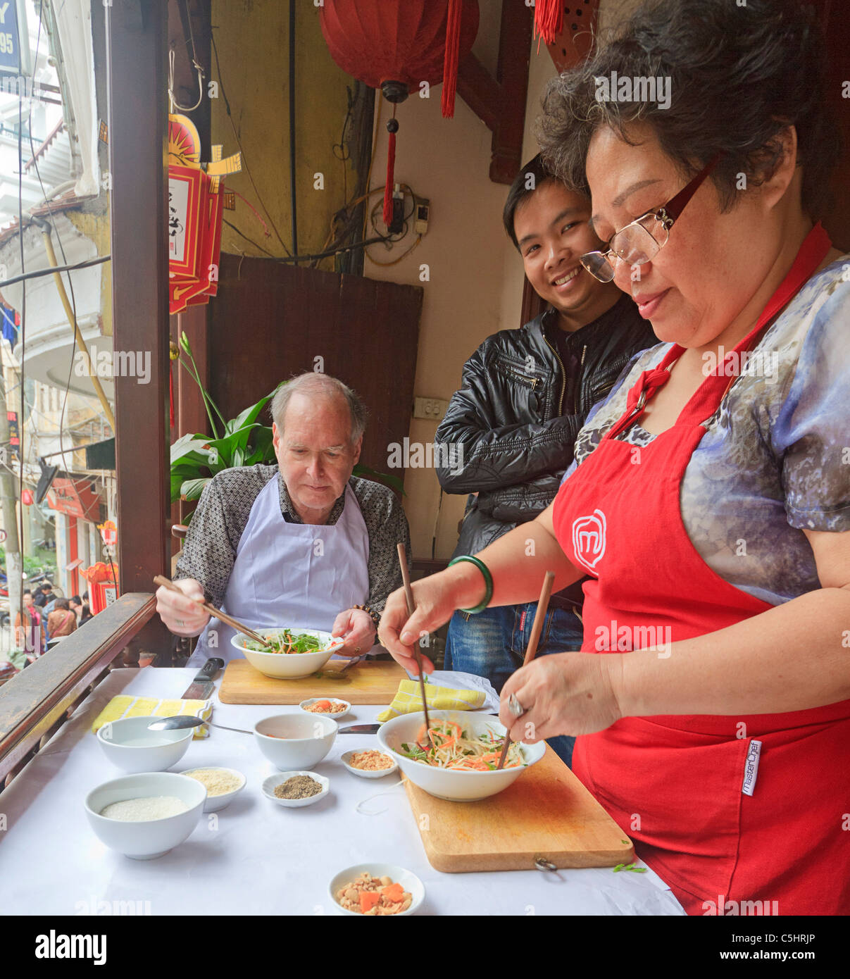 Making fresh salad at cooking class at Cafe Anh Tuyet in Hanoi, Vietnam ...