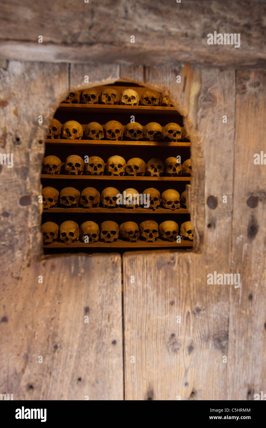 Human skulls in Meteora Monastery. Skulls from monks on shelves framed ...