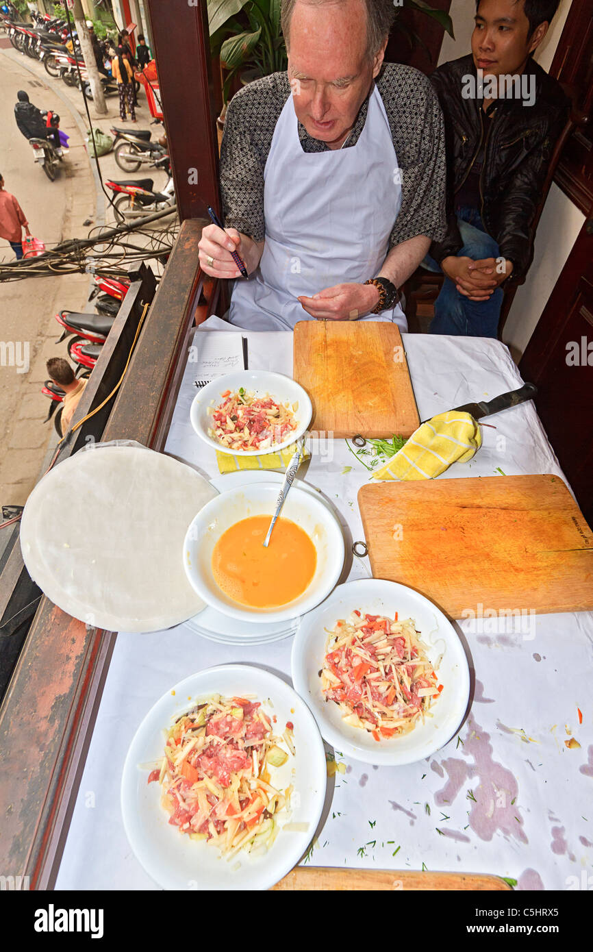 Making spring rolls at cooking class at Cafe Anh Tuyet in Hanoi ...