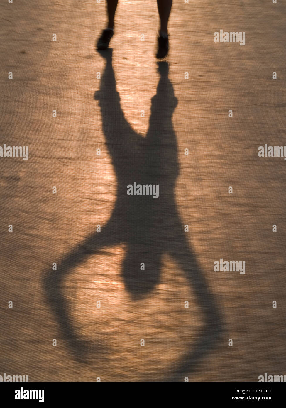 Shadows of people exercising in New York City Stock Photo - Alamy