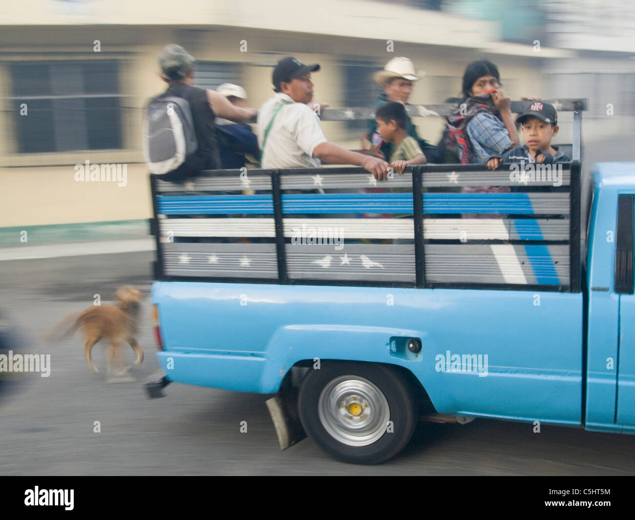 Locals riding back pick up truck hi-res stock photography and images ...