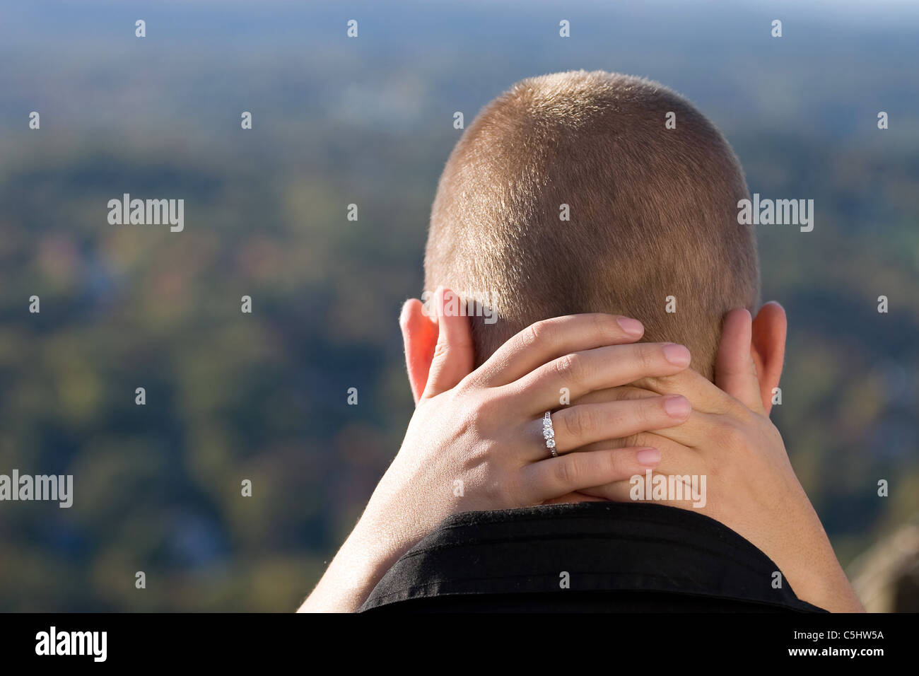 A young happy couple that just got engaged. Shallow depth of field with ...