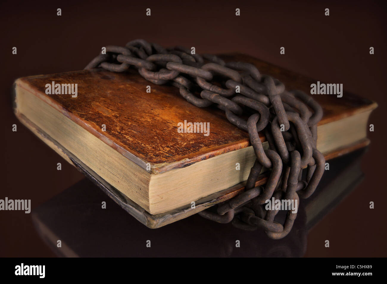 Ancient book chained closed symbolizing, hidden secret and occult ...