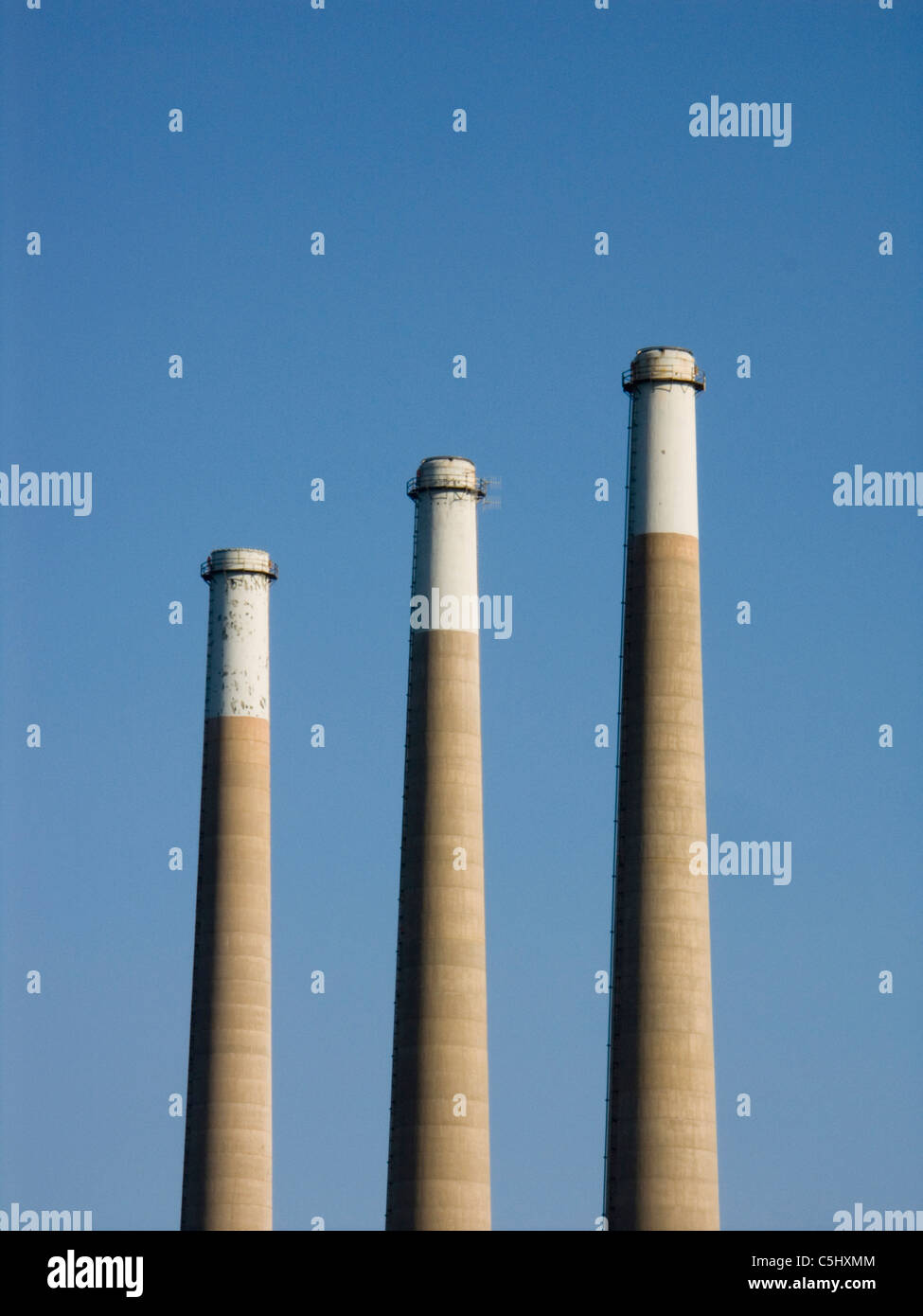 Power plant smokestacks in Morro Bay, California Stock Photo - Alamy