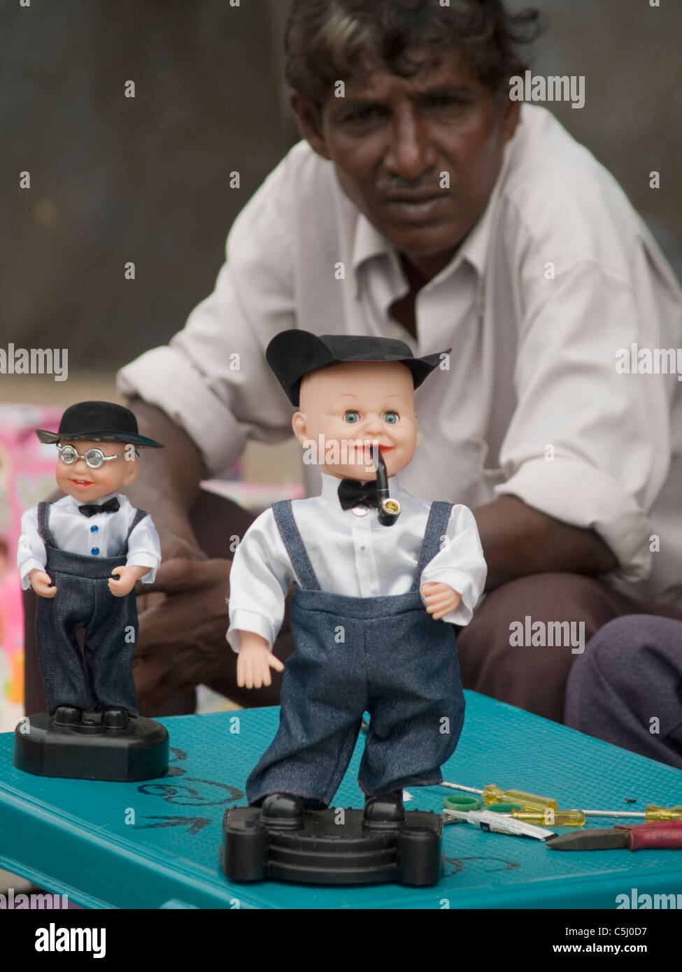 Local Sri Lankan culture contrasts with international toys in Colombo ...