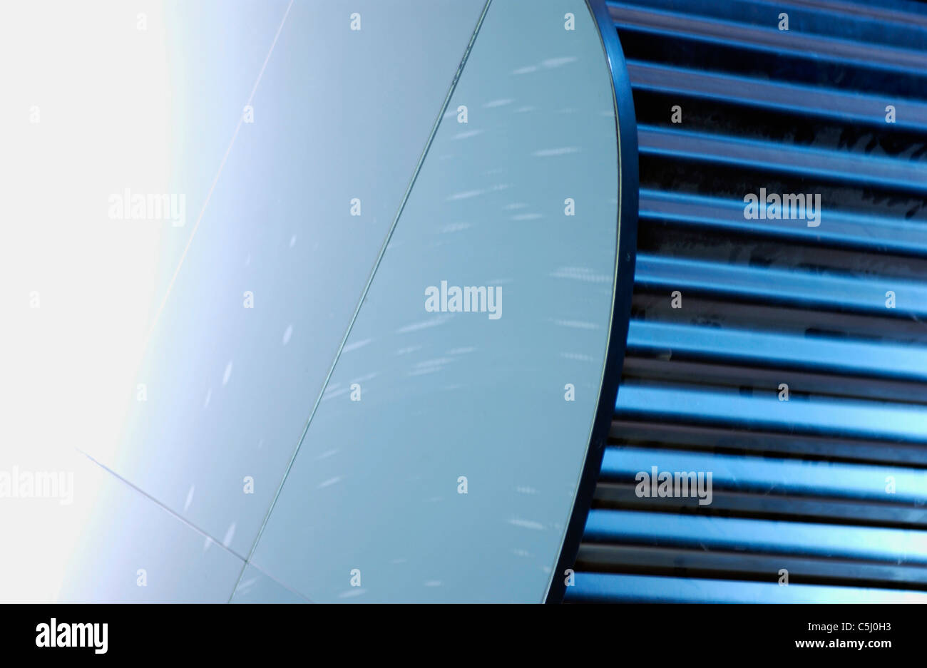 Blue-lit slats and flat surface Stock Photo - Alamy