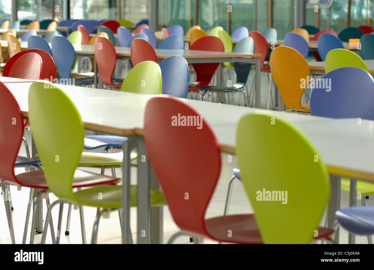 Colourful colorful dining chairs Stock Photo - Alamy