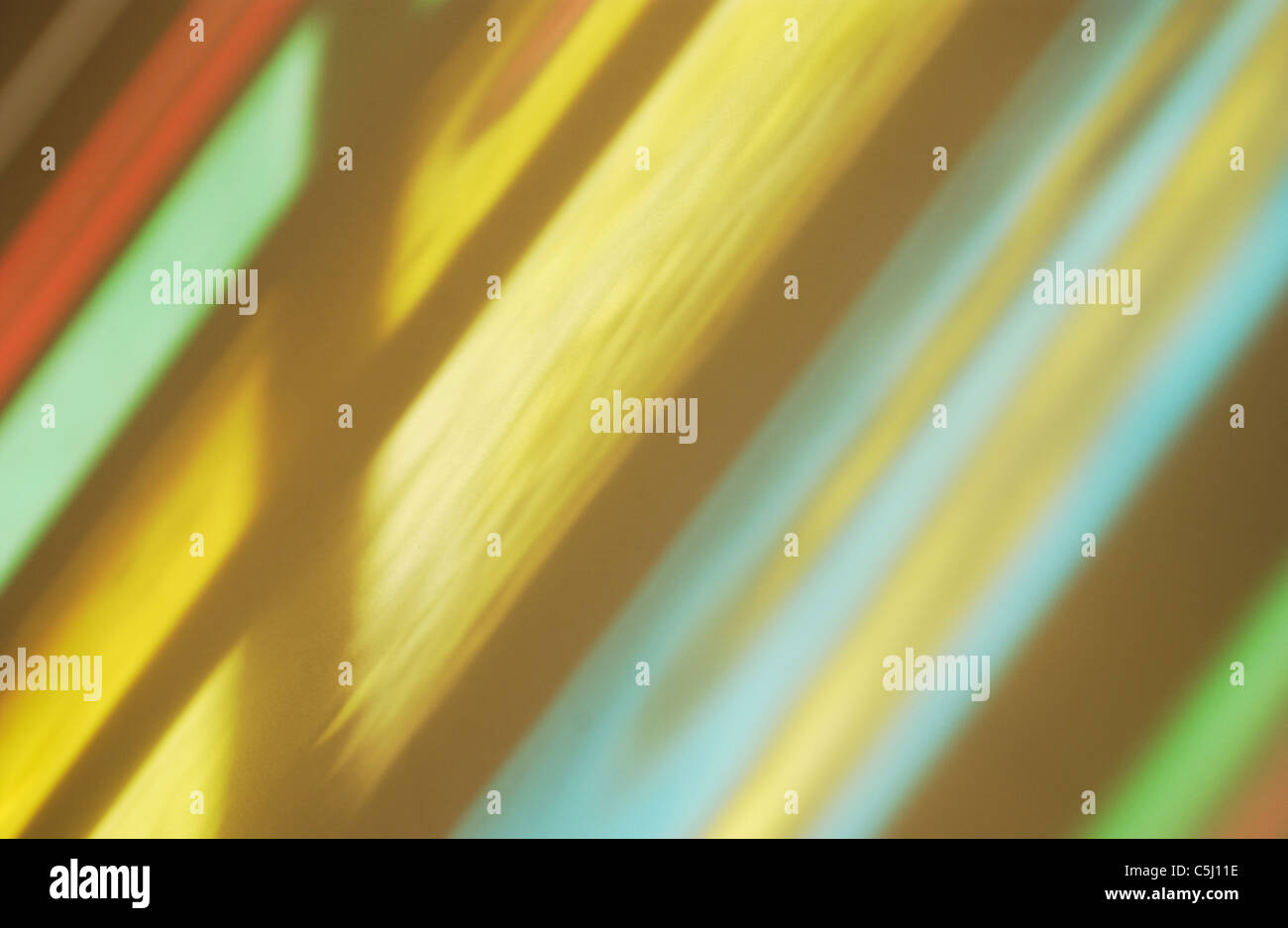 light from a stained glass window falling on a wall Stock Photo - Alamy