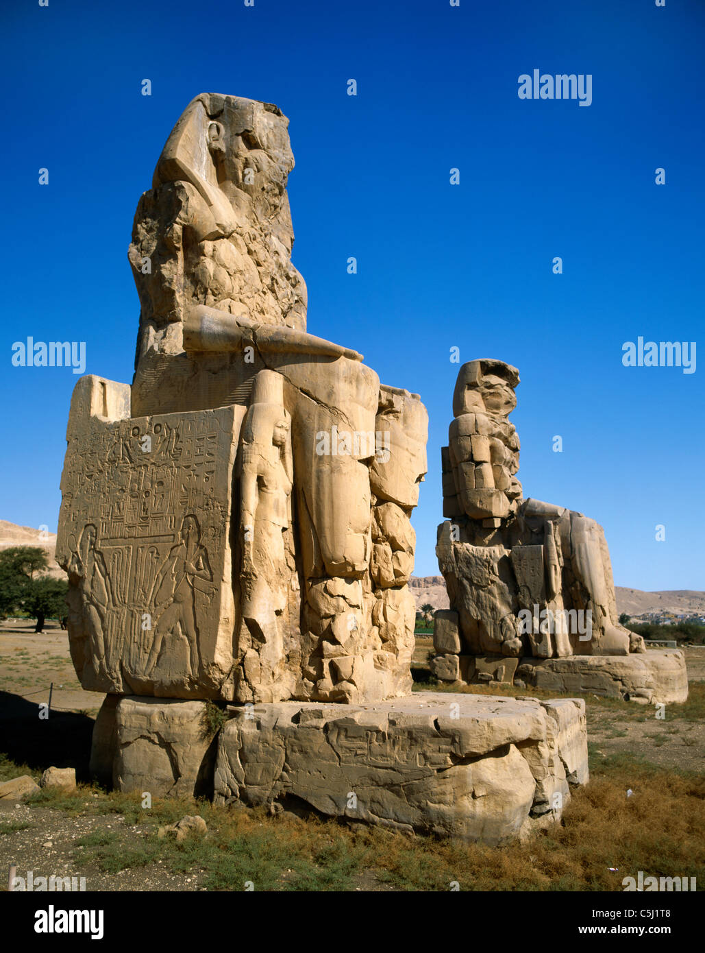 Luxor Egypt Colossi Of Memnon Remains of the Mortuary Temple of ...
